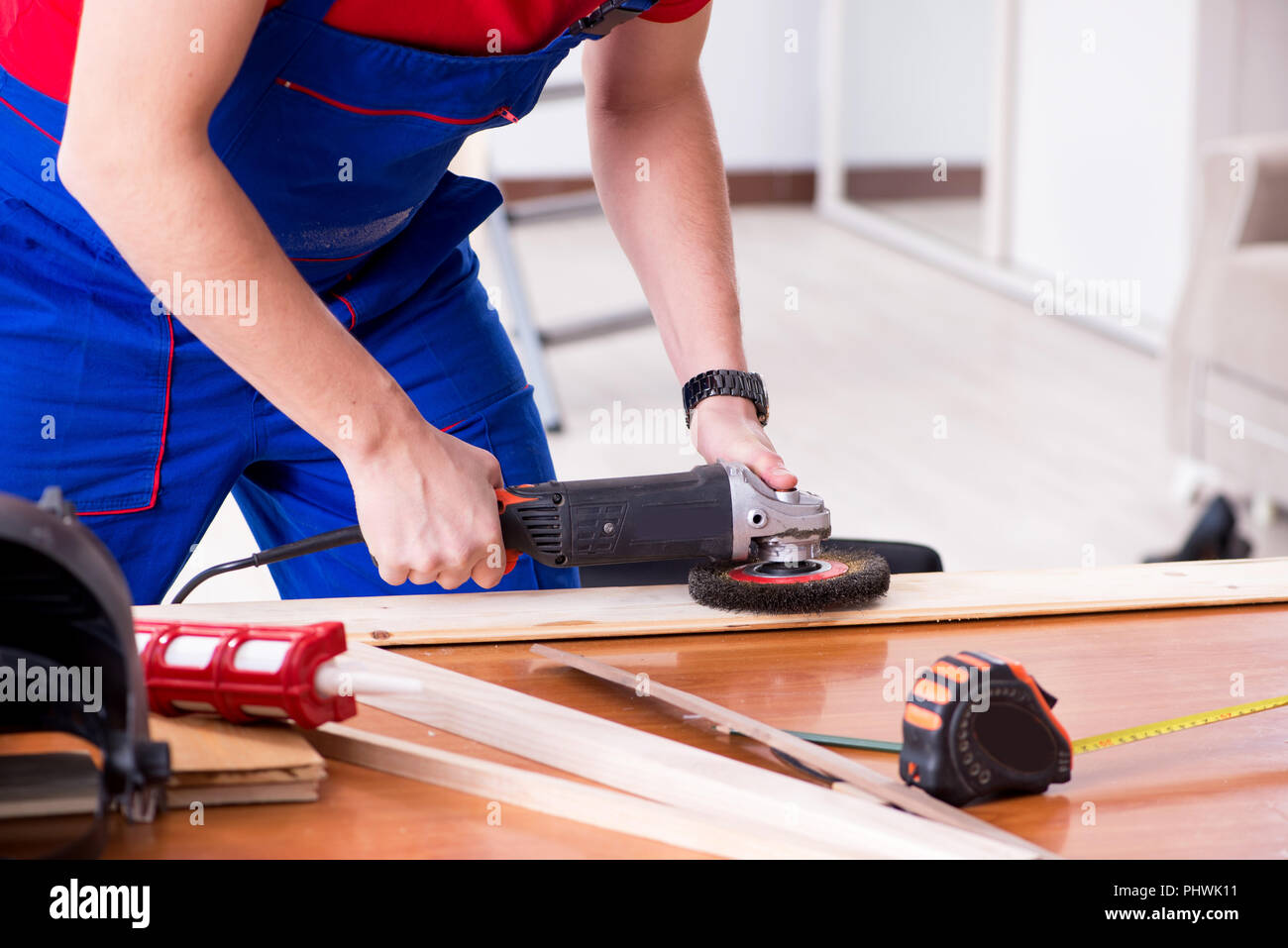 Contractor working in the workshop Stock Photo - Alamy