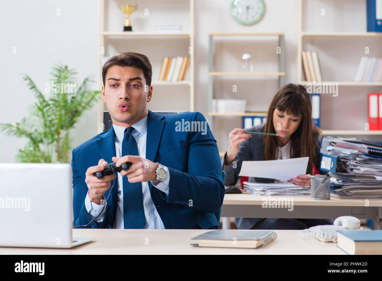 Office busy lazy hi-res stock photography and images - Alamy