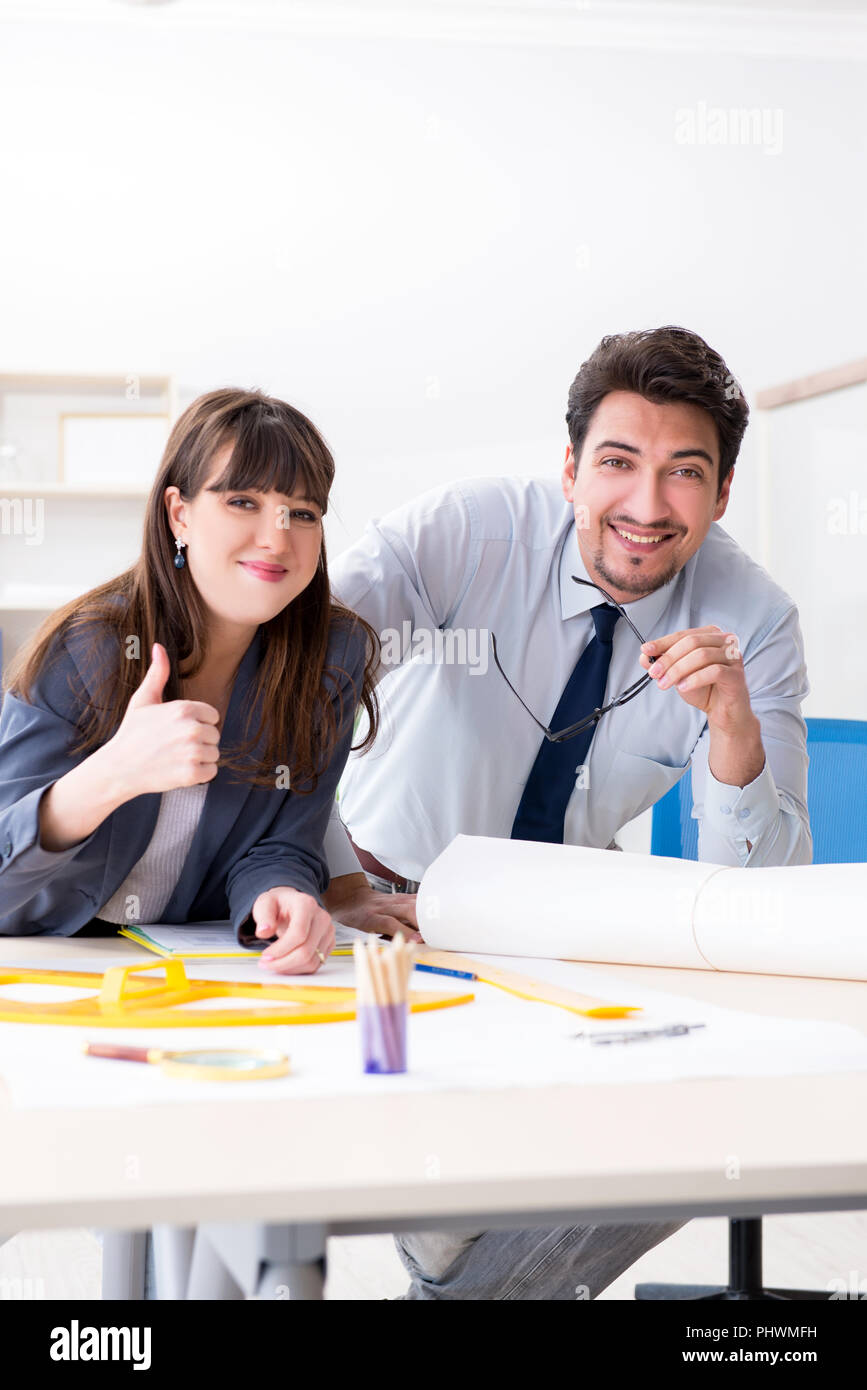 Engineers working on new project Stock Photo - Alamy