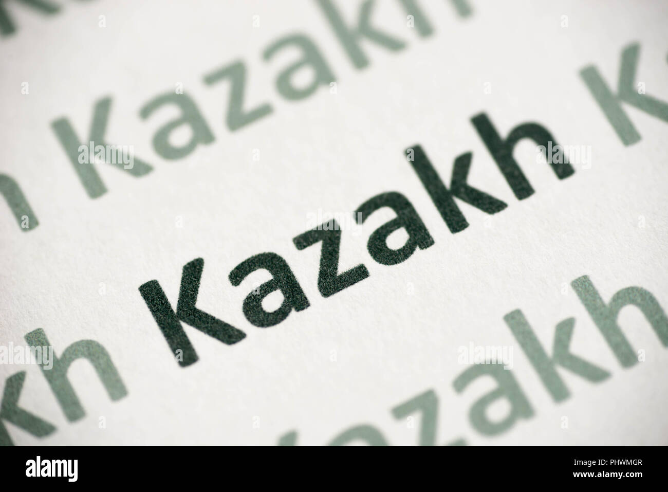 word Kazakh language printed on white paper macro Stock Photo - Alamy