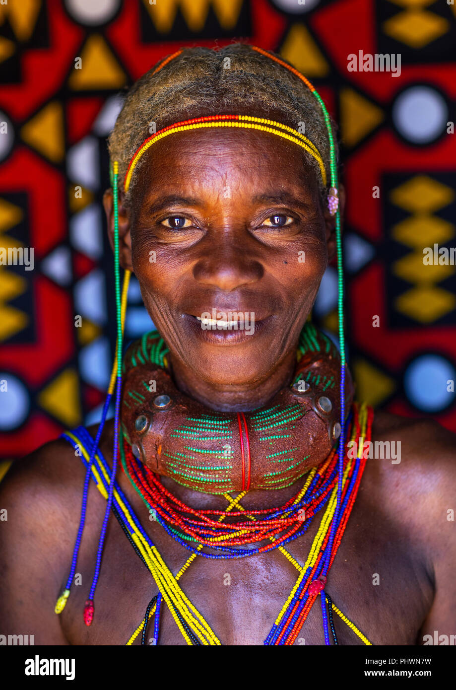 Mungambue tribe woman with the traditional hairtsyle and necklace ...
