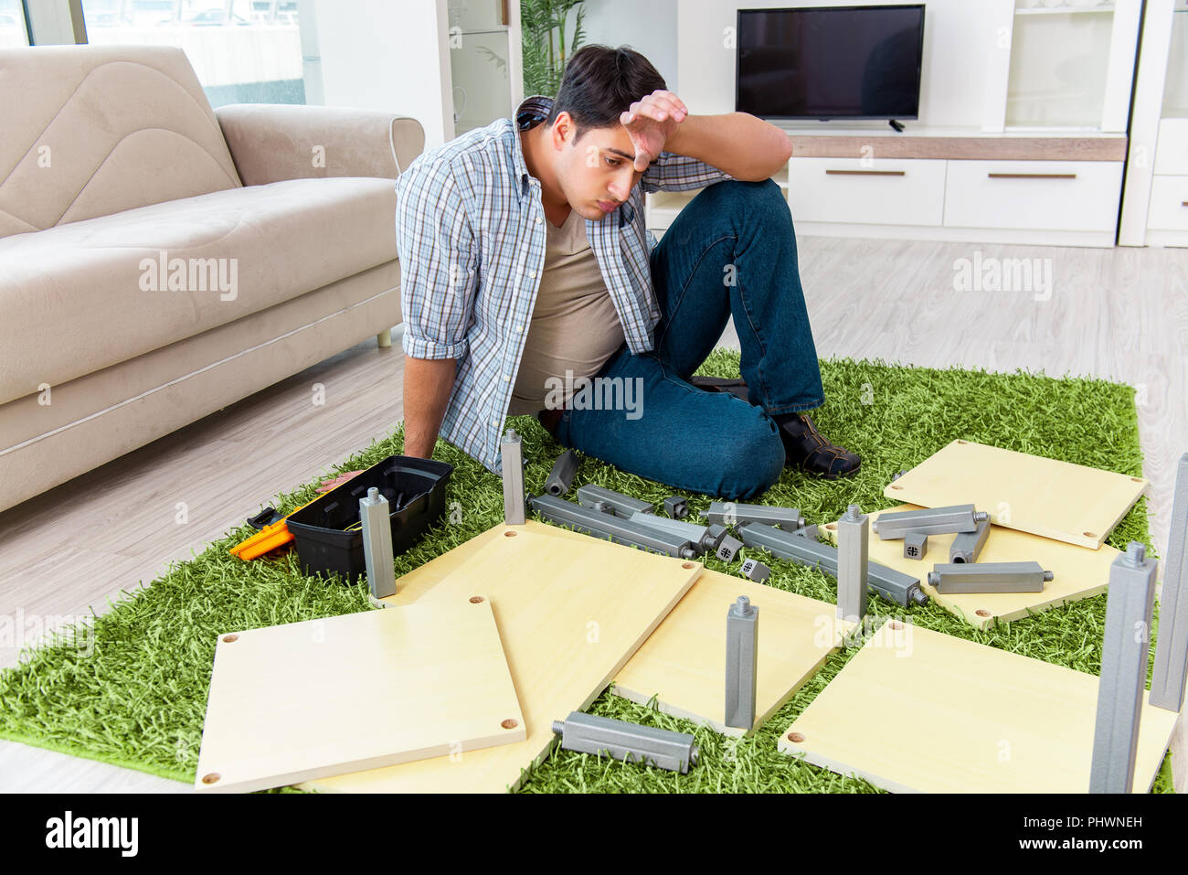 Man fixing car home hi-res stock photography and images - Alamy