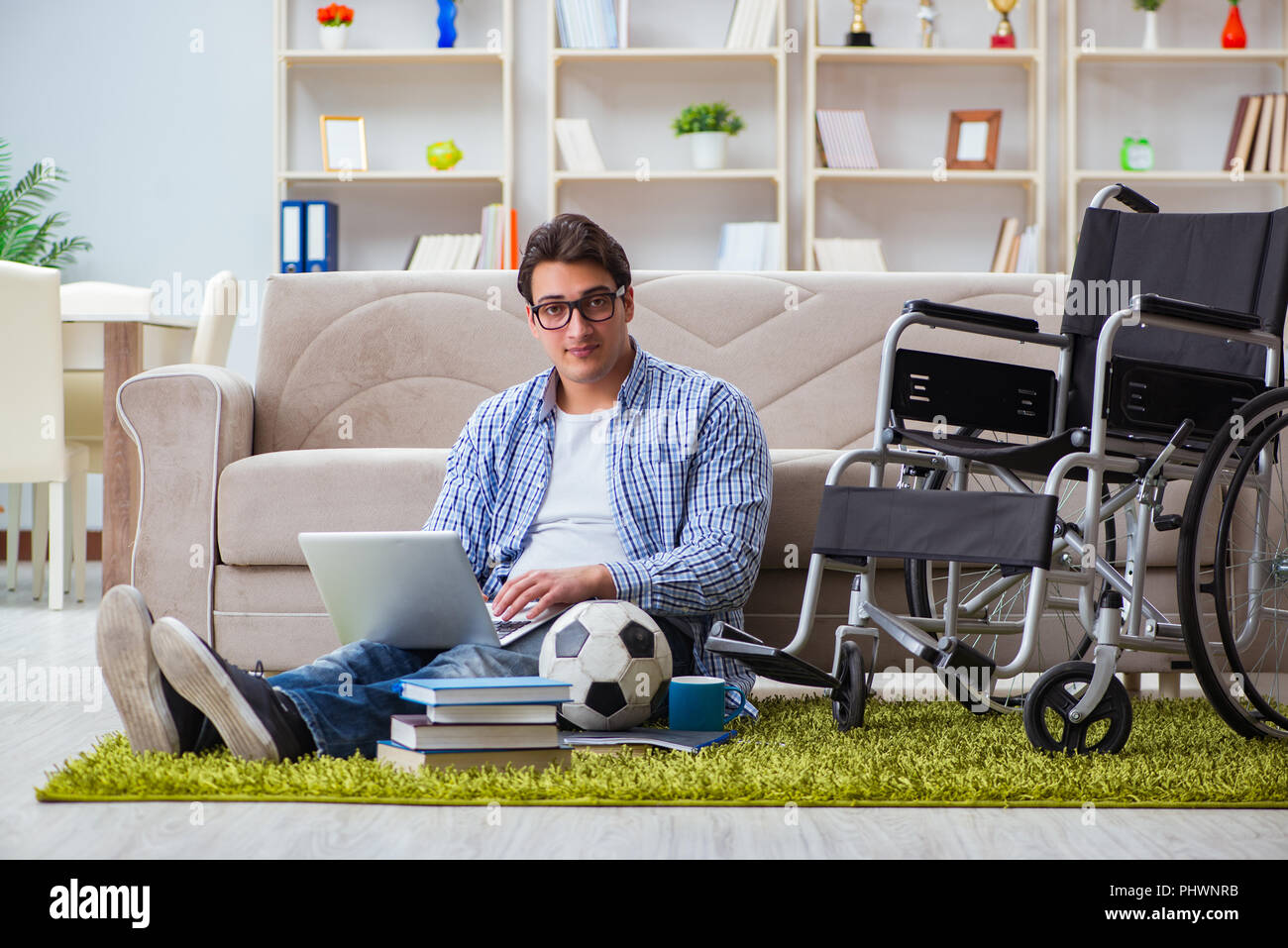 Young student studying at home Stock Photo - Alamy