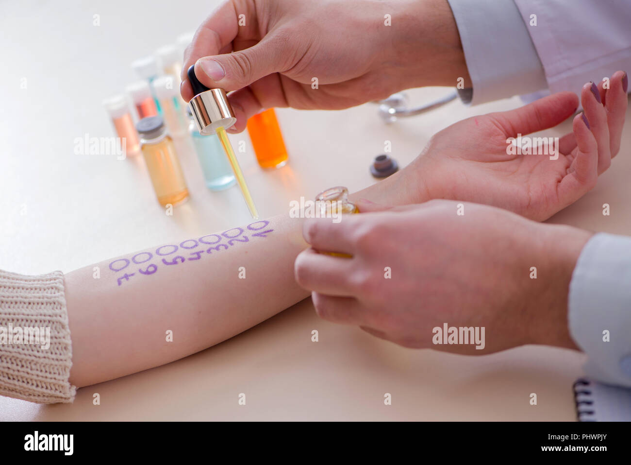 Doctor testing allergy reaction of patient in hospital Stock Photo - Alamy