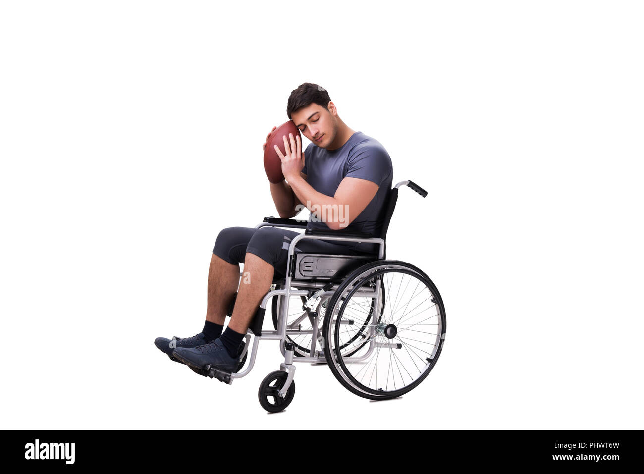 Football player recovering from injury on wheelchair Stock Photo - Alamy