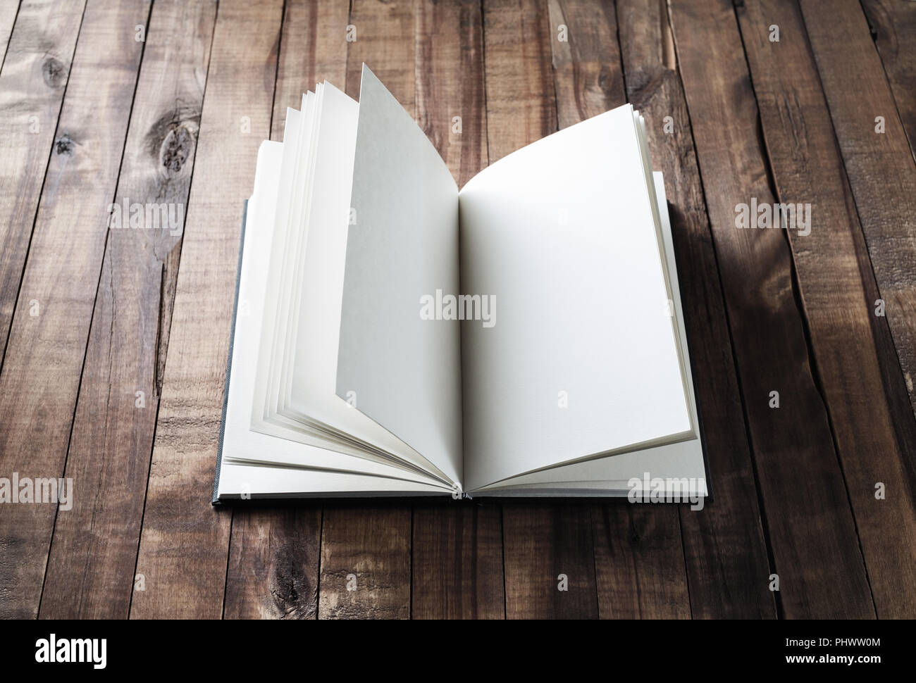 Blank open book on wooden table background Stock Photo - Alamy