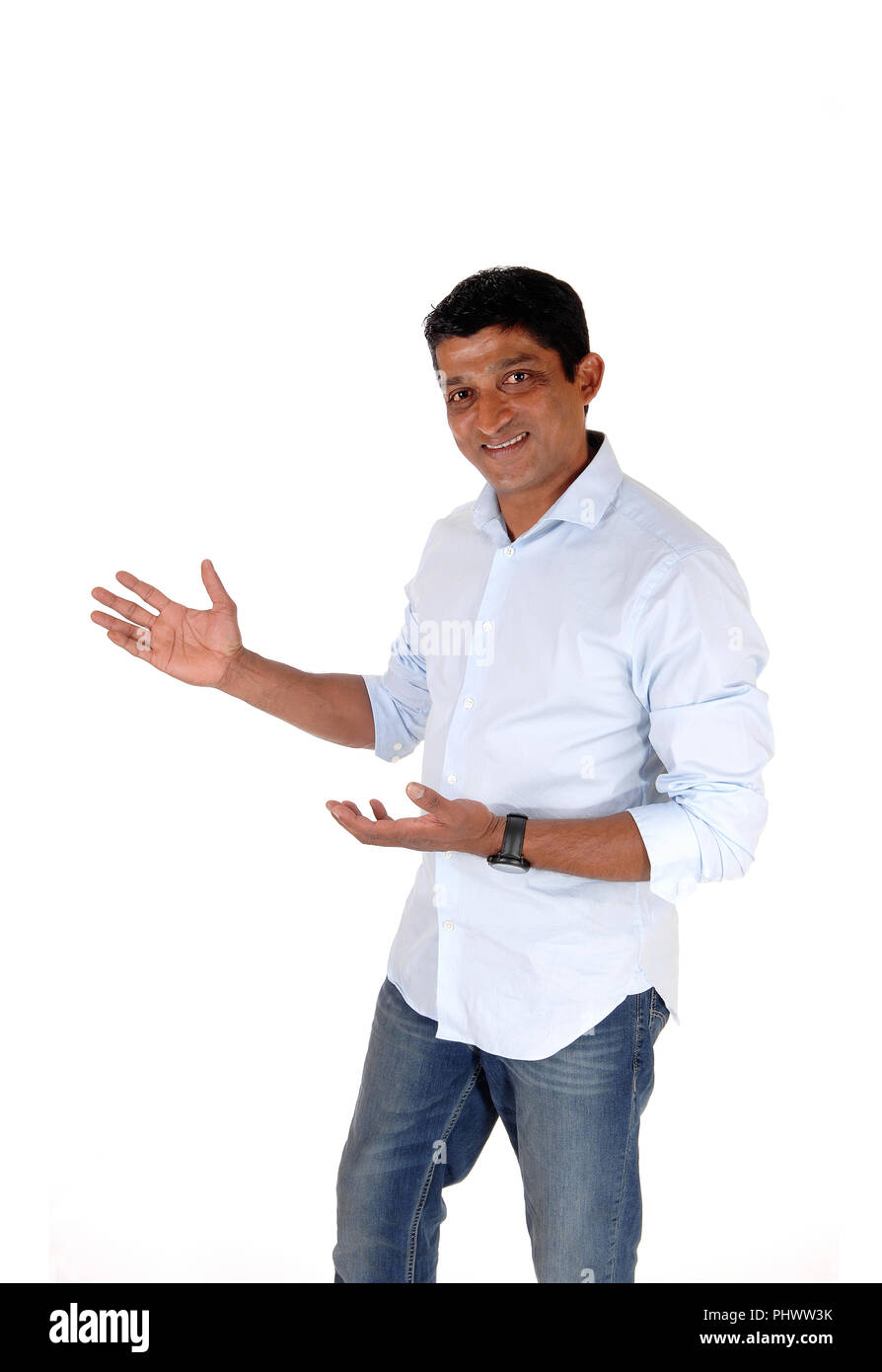 Isolated young man giving something hi-res stock photography and images ...