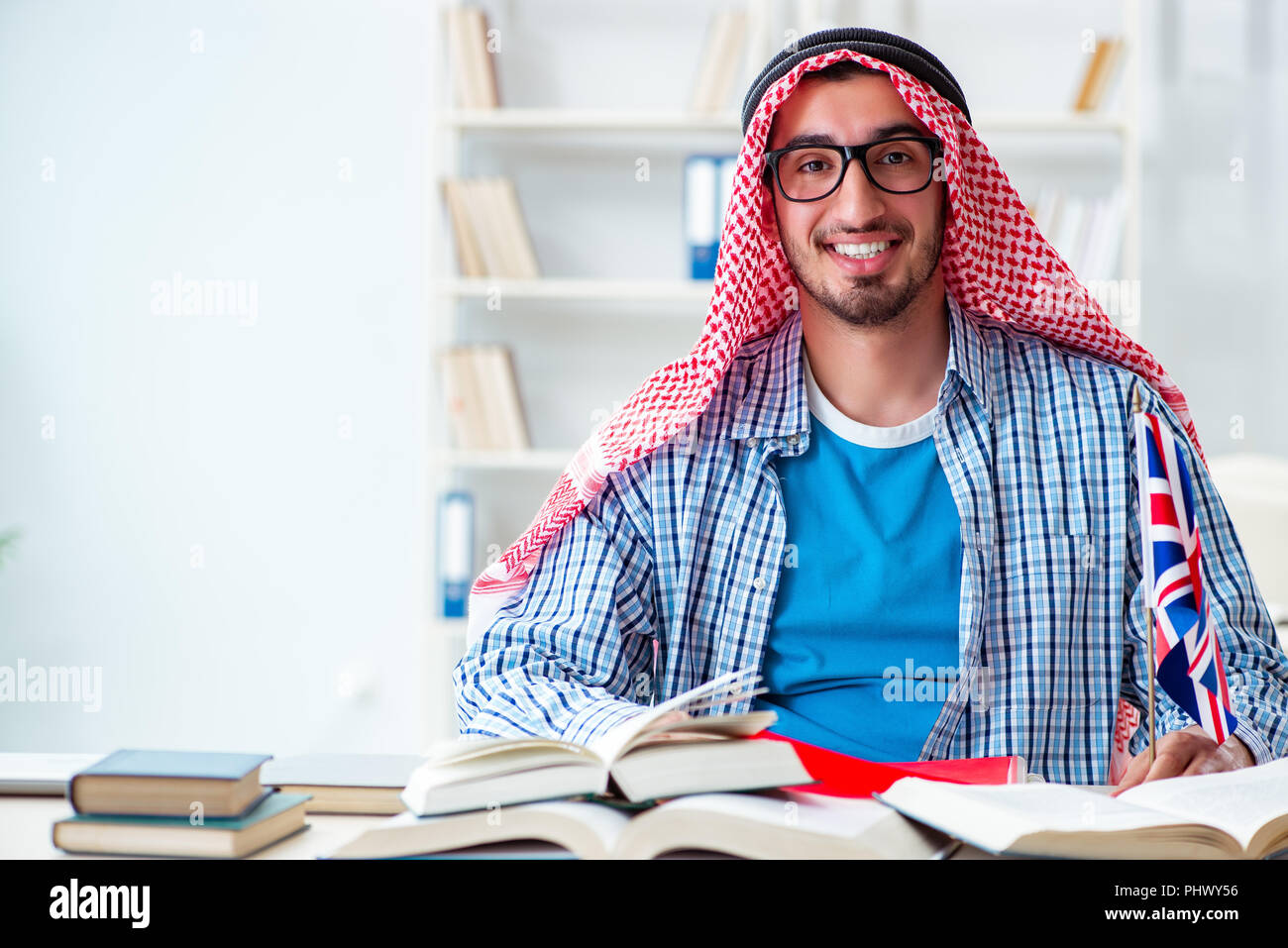Arab student studying english language Stock Photo - Alamy