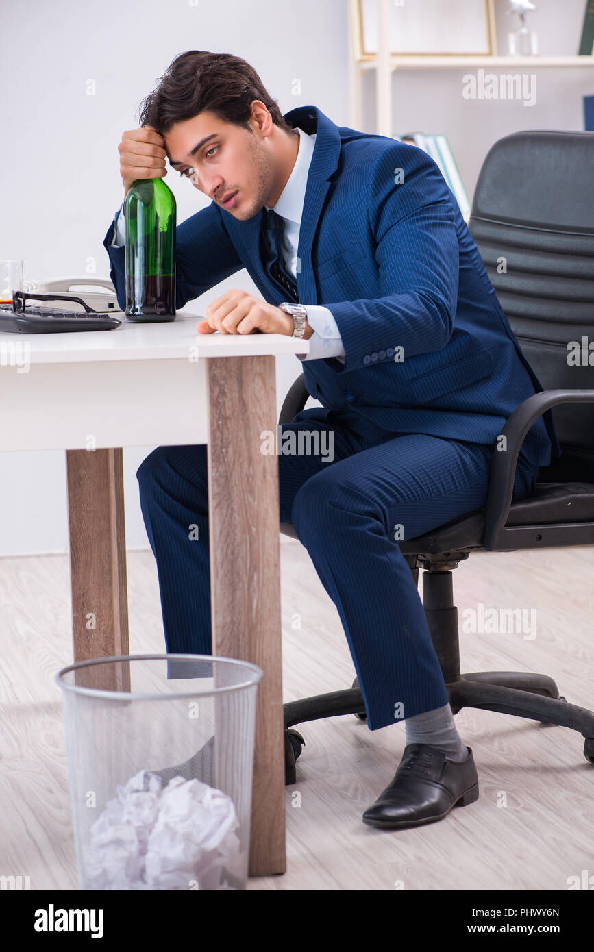 Young drunk employee in the office hi-res stock photography and images ...