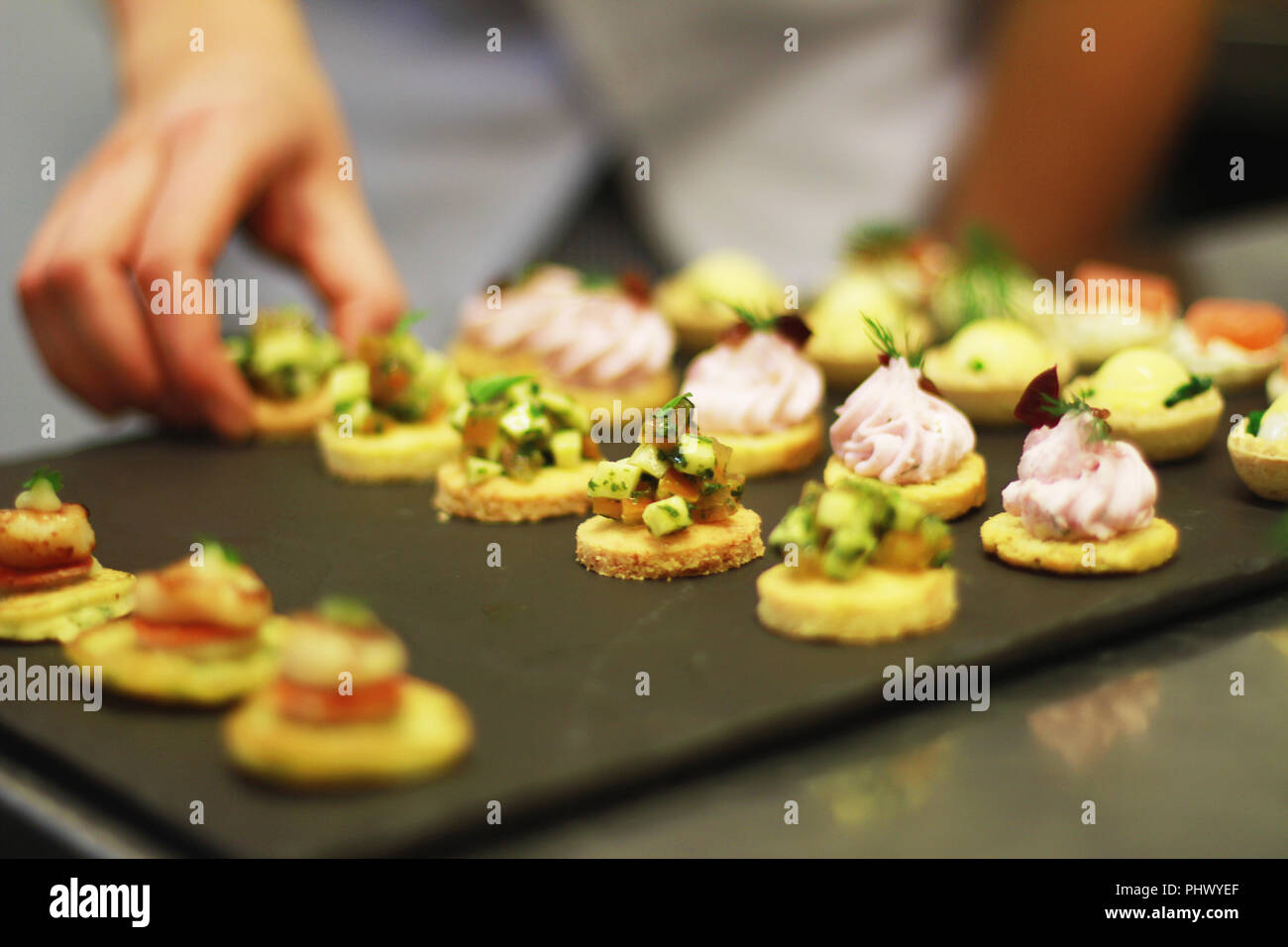 Chef making canapes hi-res stock photography and images - Alamy