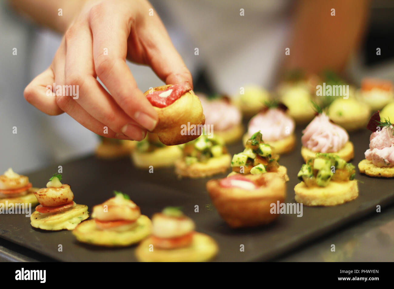 Chef making canapes hi-res stock photography and images - Alamy