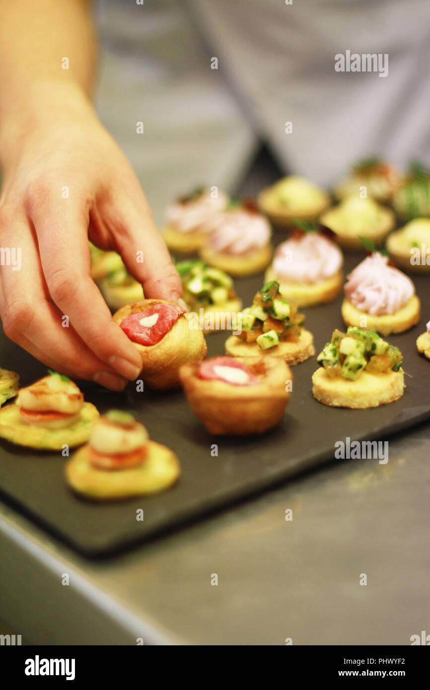 Chef making canapes hi-res stock photography and images - Alamy