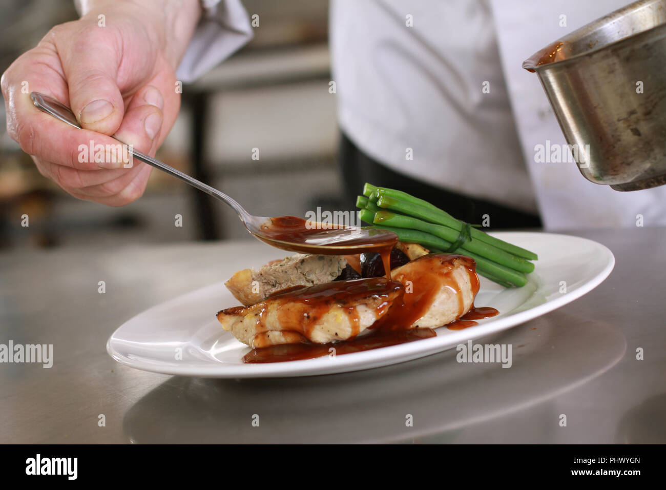 Plating chicken dinner hi-res stock photography and images - Alamy
