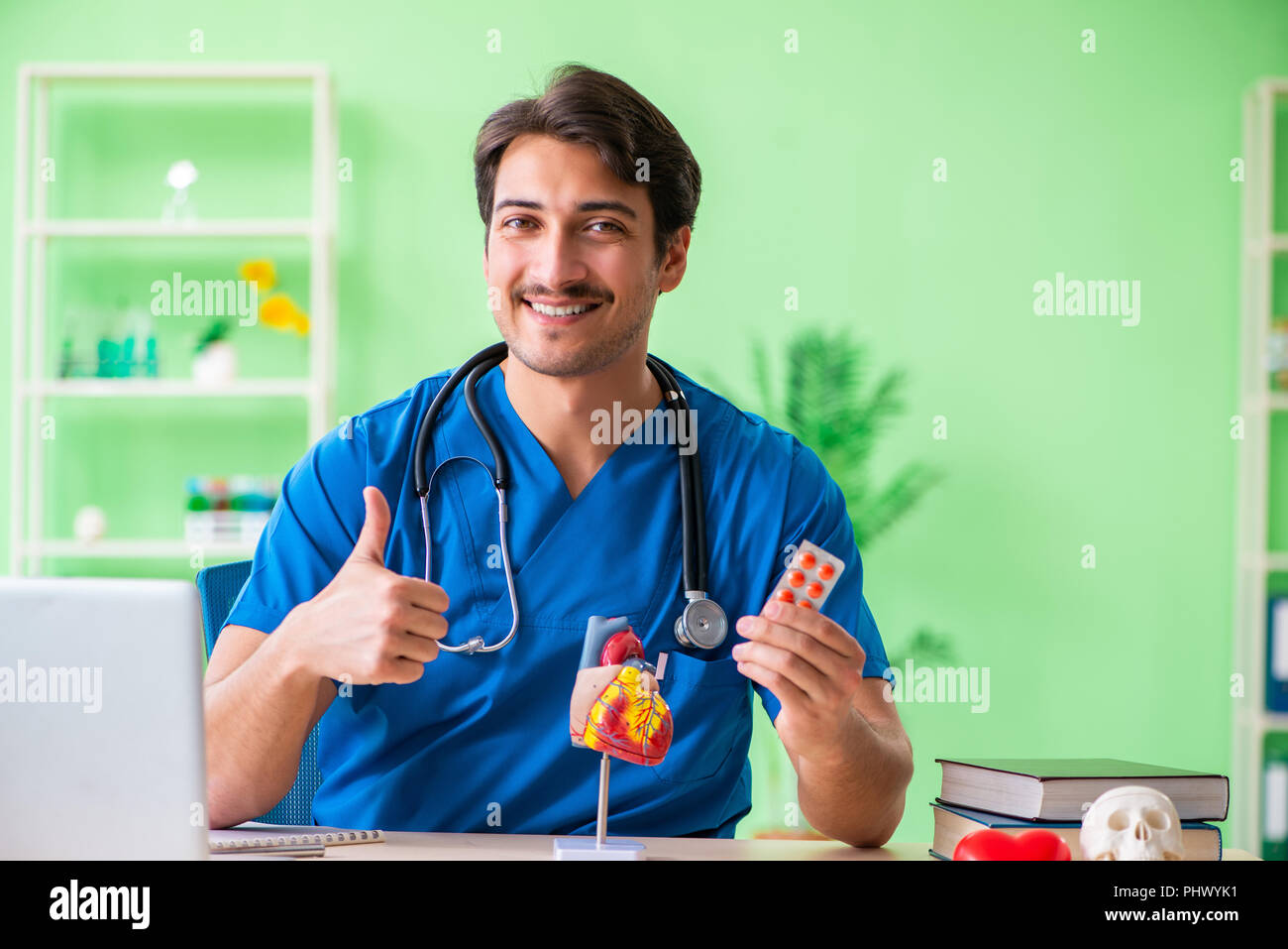 Doctor student explaining heart problems Stock Photo - Alamy