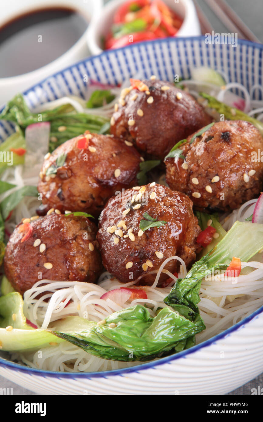 traditional chinese yuksum balls with noodles Stock Photo - Alamy