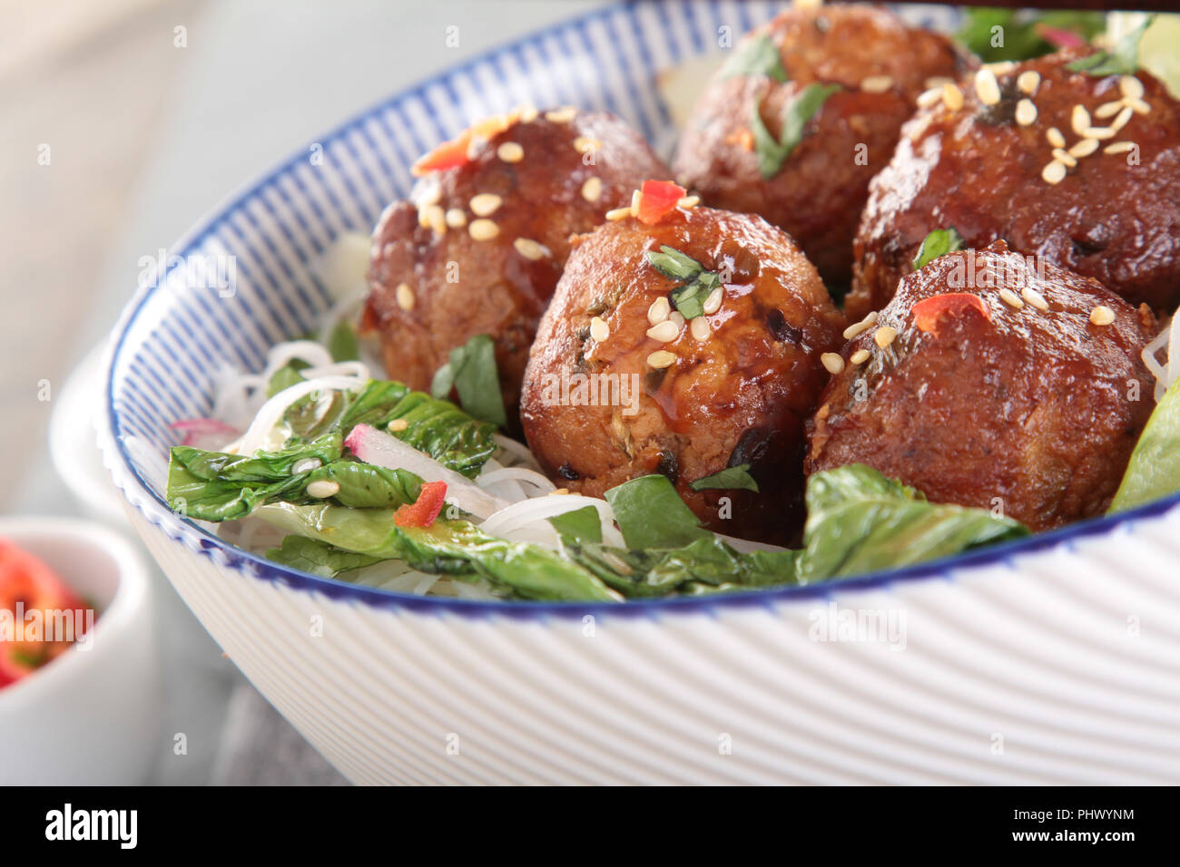 traditional chinese yuksum balls with noodles Stock Photo - Alamy