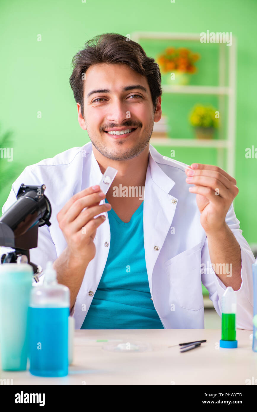 Chemist testing soap in the lab Stock Photo - Alamy