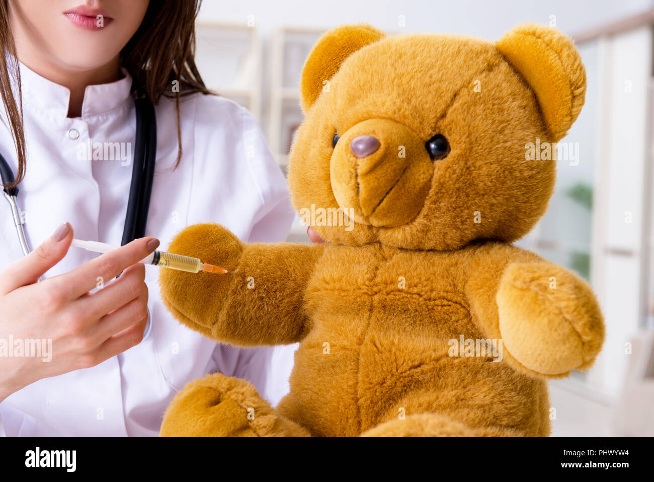 Child checking soft toy health Stock Photo - Alamy