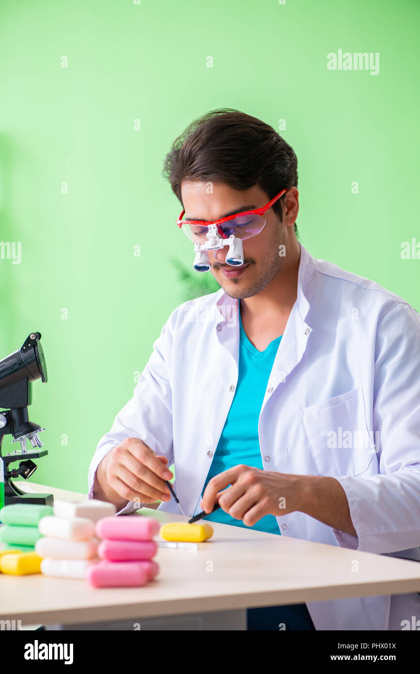 Chemist testing soap in the lab Stock Photo - Alamy