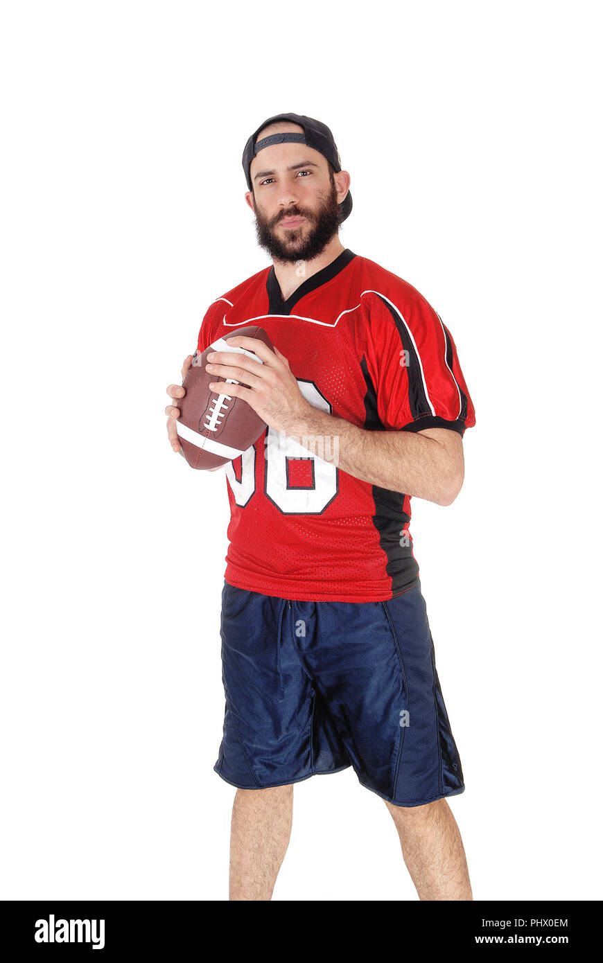 Young male footballer standing hi-res stock photography and images - Alamy