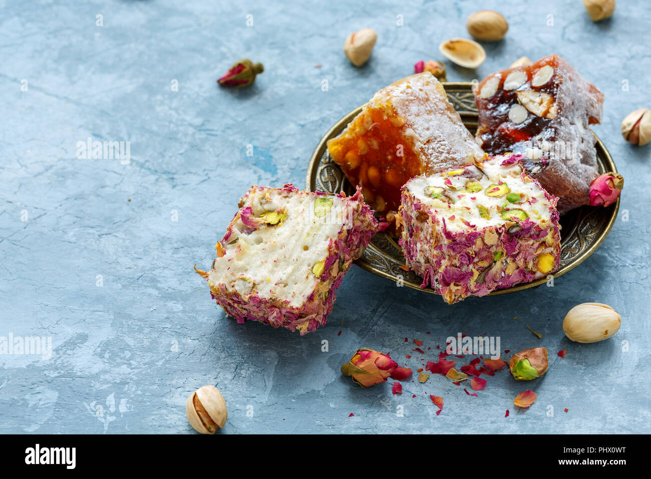 Turkish delight with pistachios, pink petals and almonds Stock Photo ...