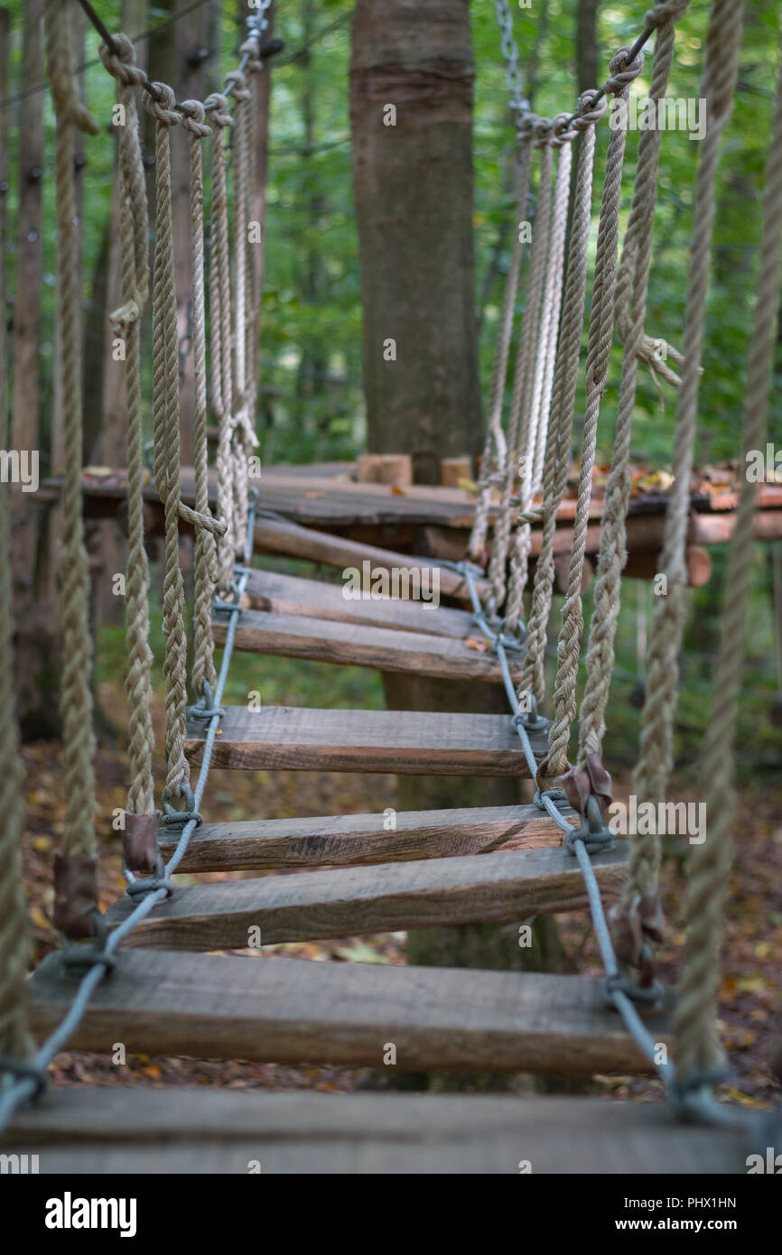 Rope bridge at adventure climbing park with natural background Stock ...