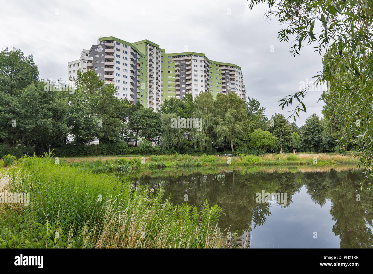 modern urban residential architecture with park lake in Berlin, Germany ...
