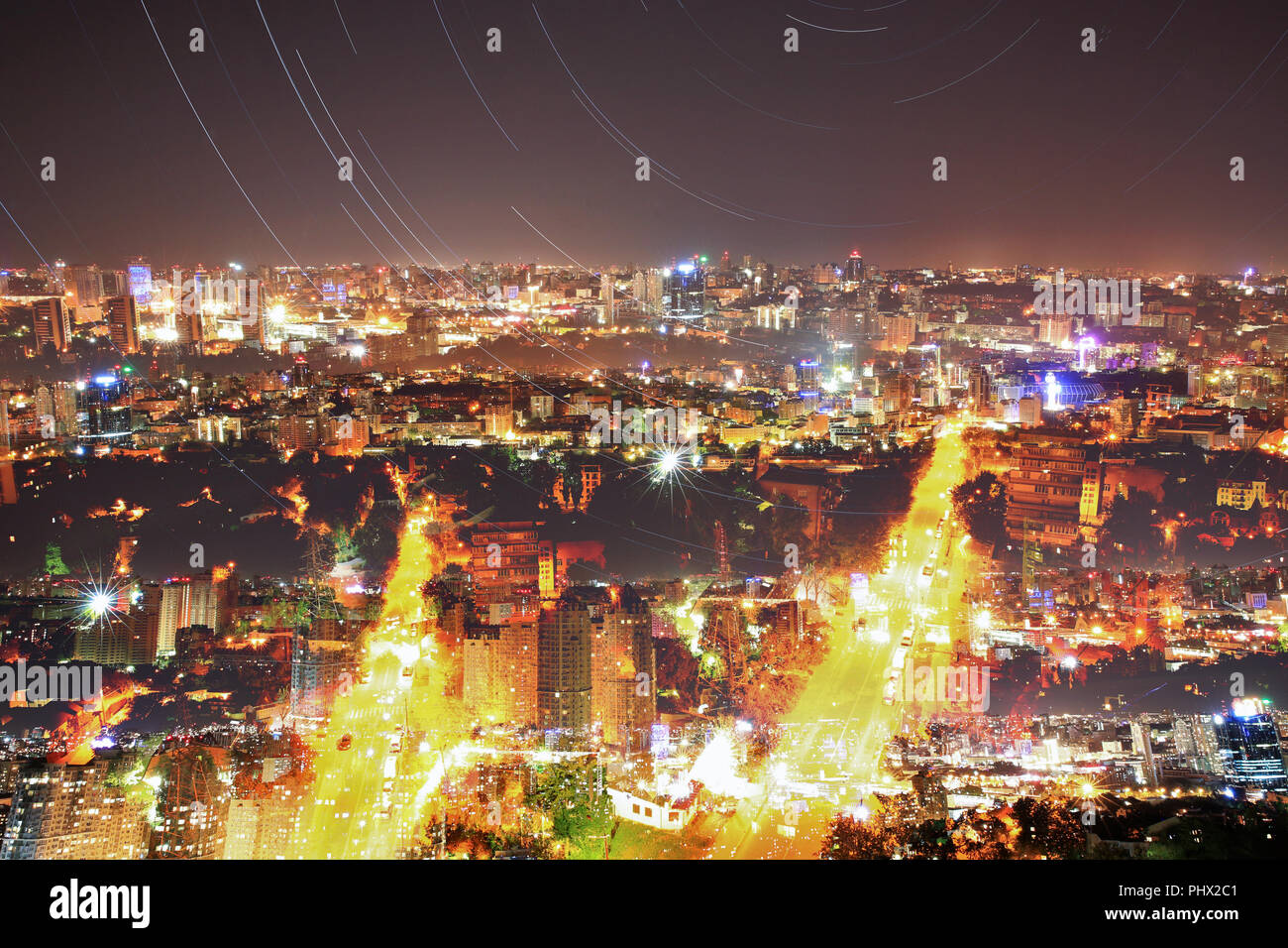 Urban night cityscape abstract collage with star tracks. Kiev, Ukraine ...