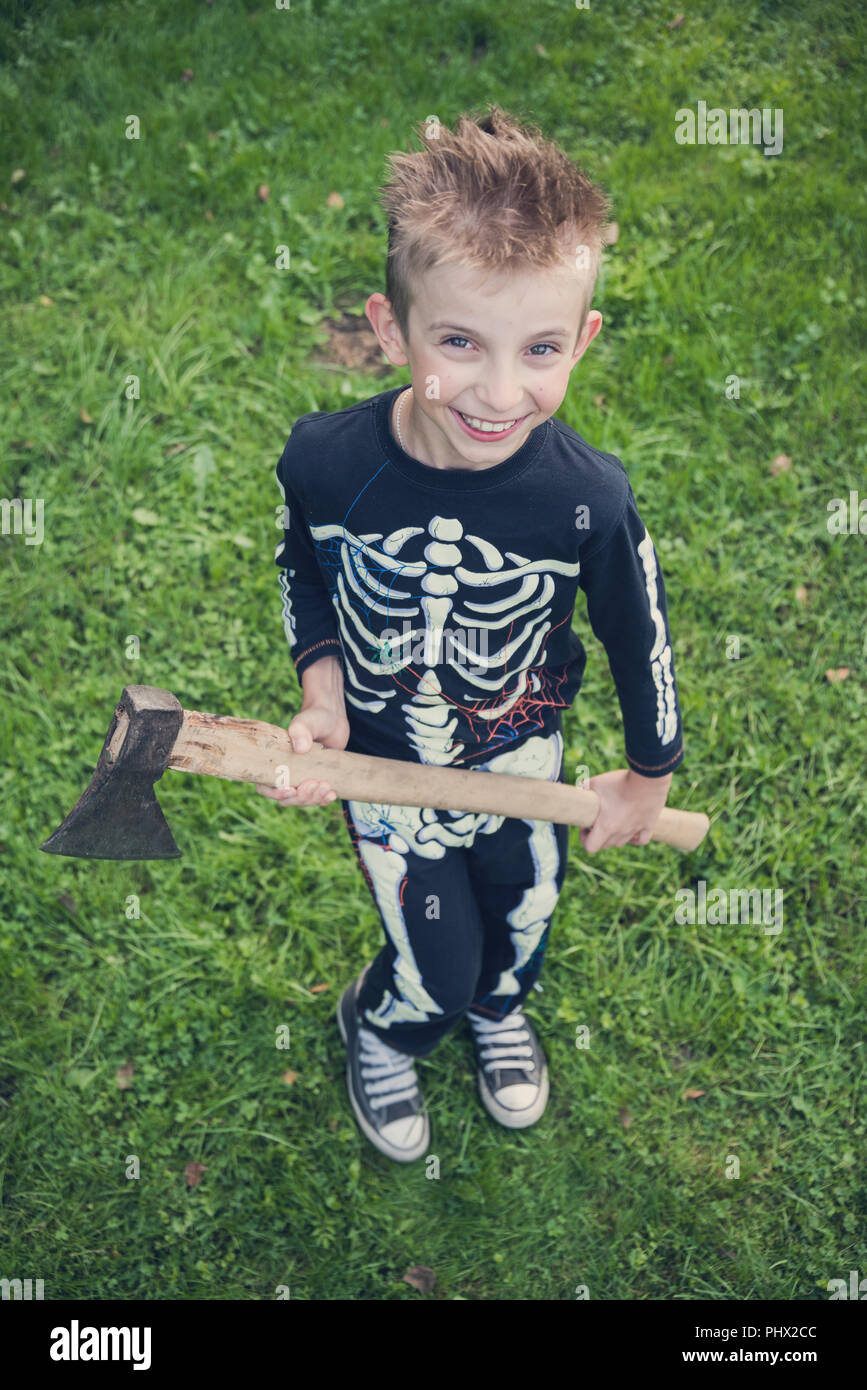 Halloween skeleton boy with axe,spooky Stock Photo - Alamy