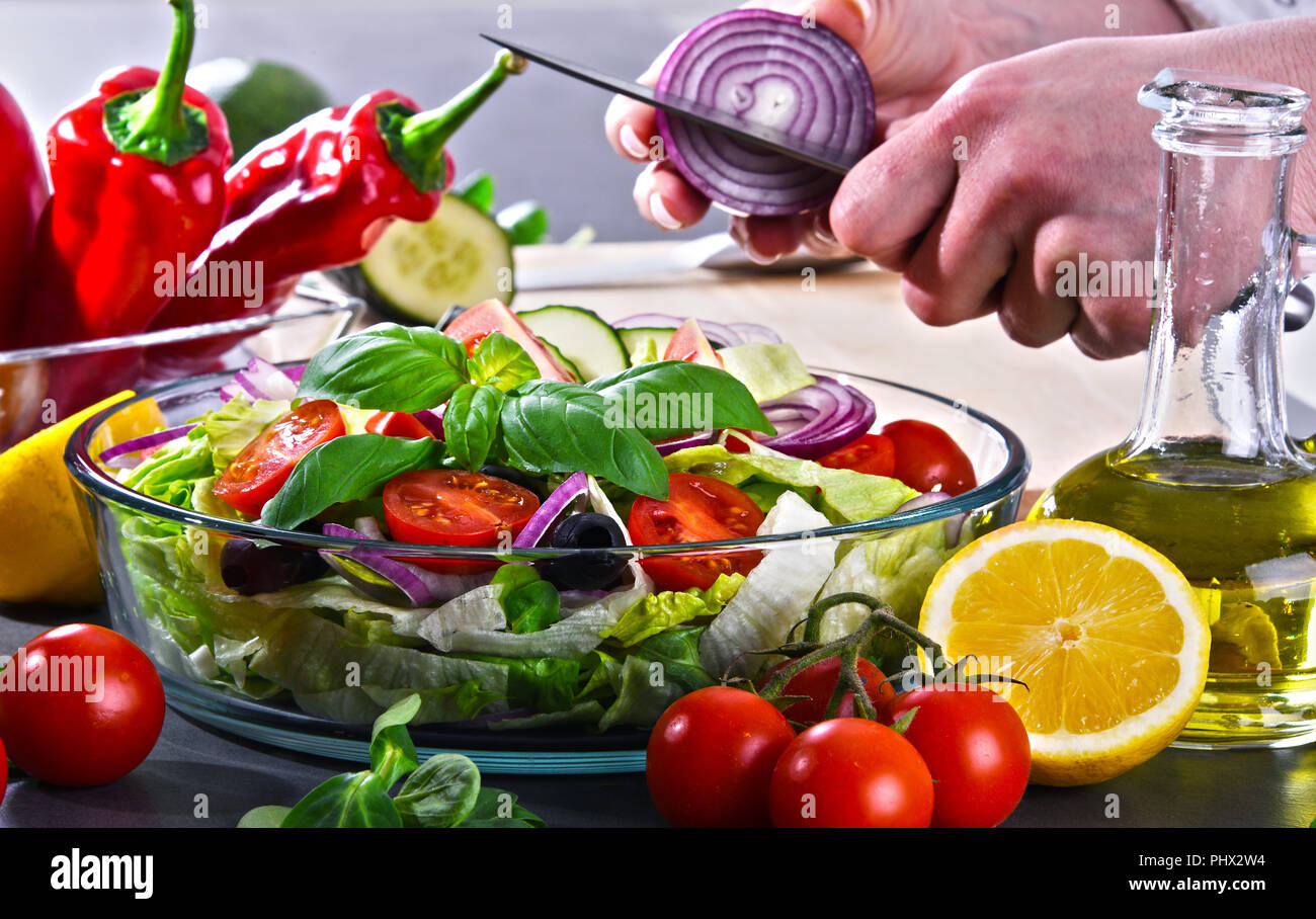 Preparation of a vegetable salad from fresh organic ingredients Stock ...