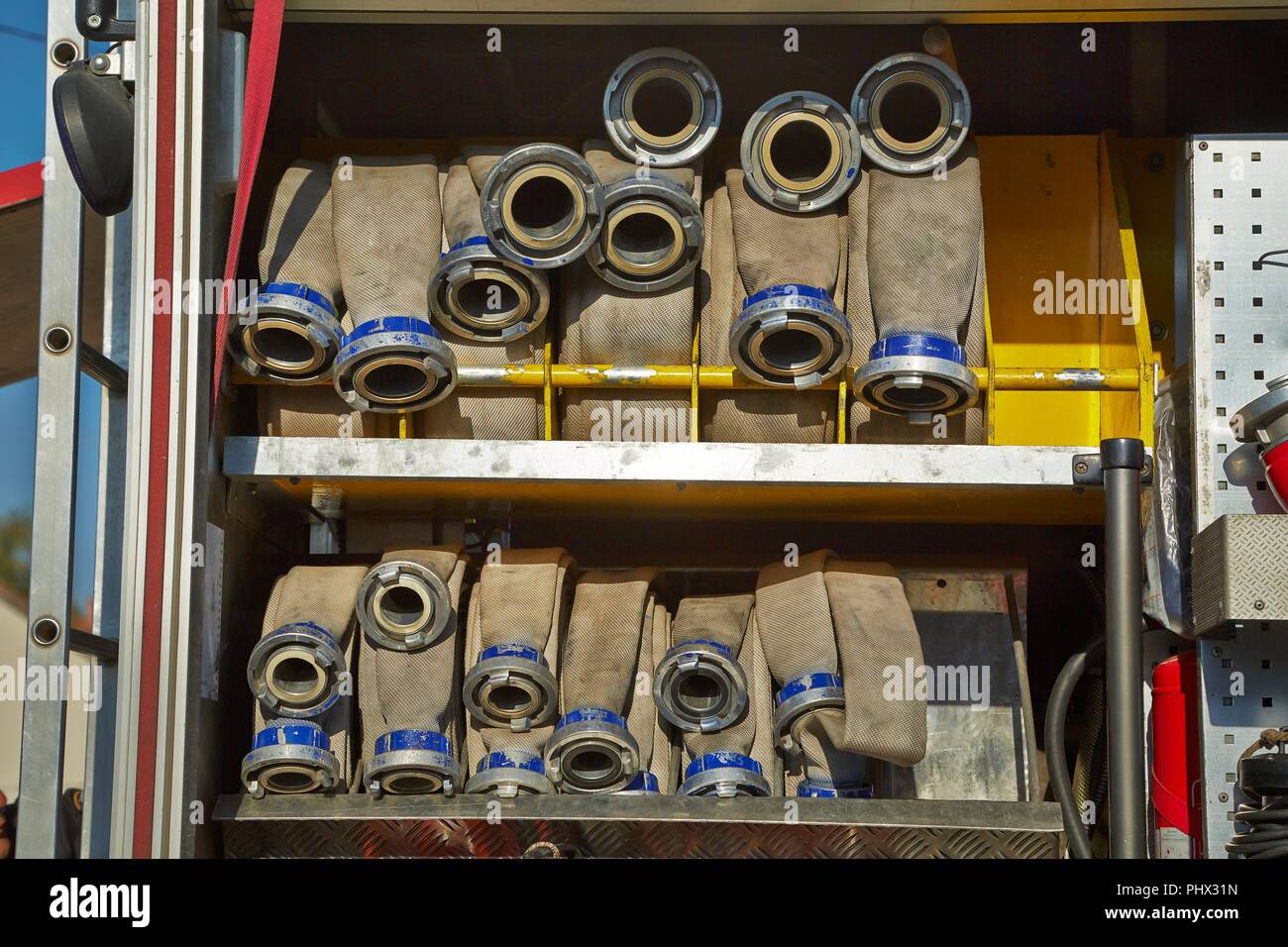 Hoses of a fire truck Stock Photo - Alamy