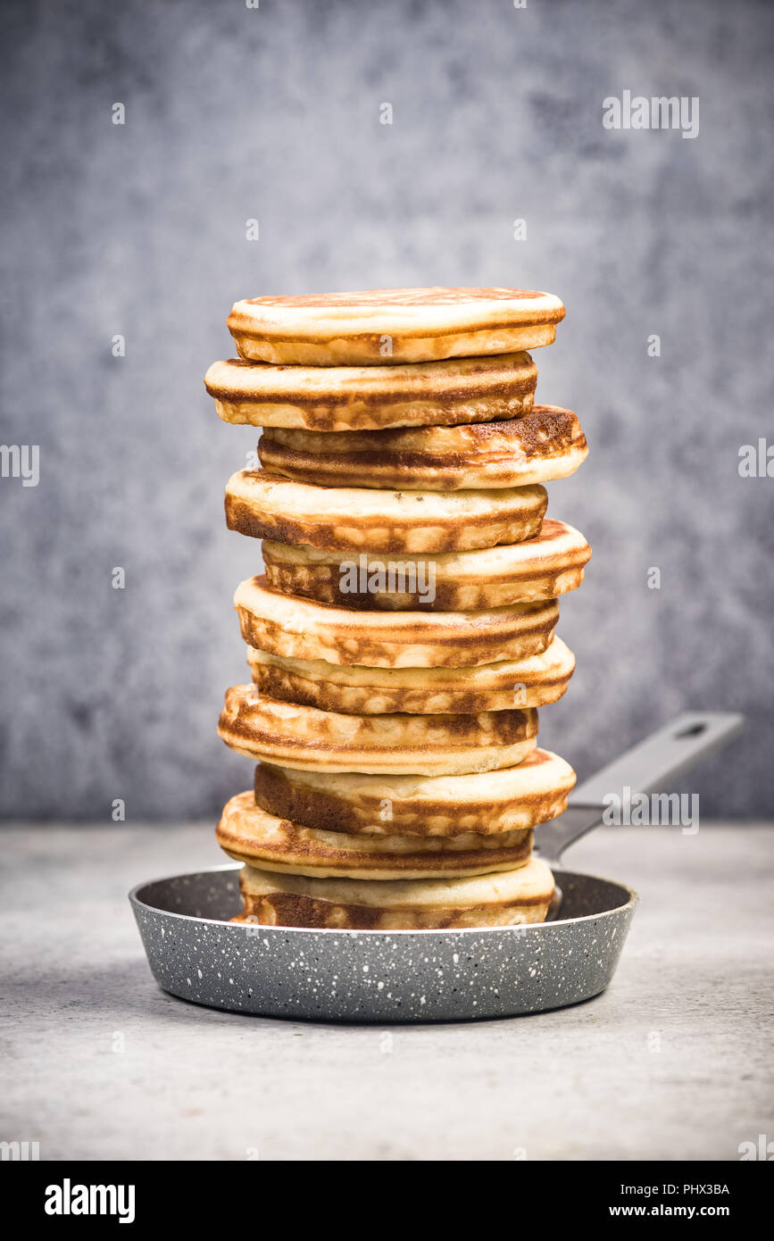 Tower made of pancakes on pan Stock Photo - Alamy