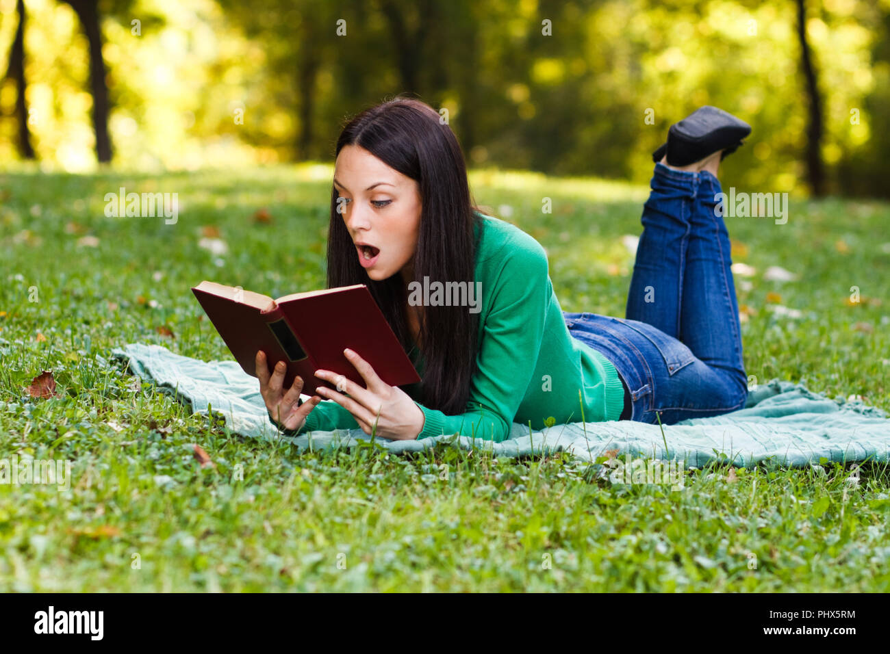Shock reading book hi-res stock photography and images - Alamy