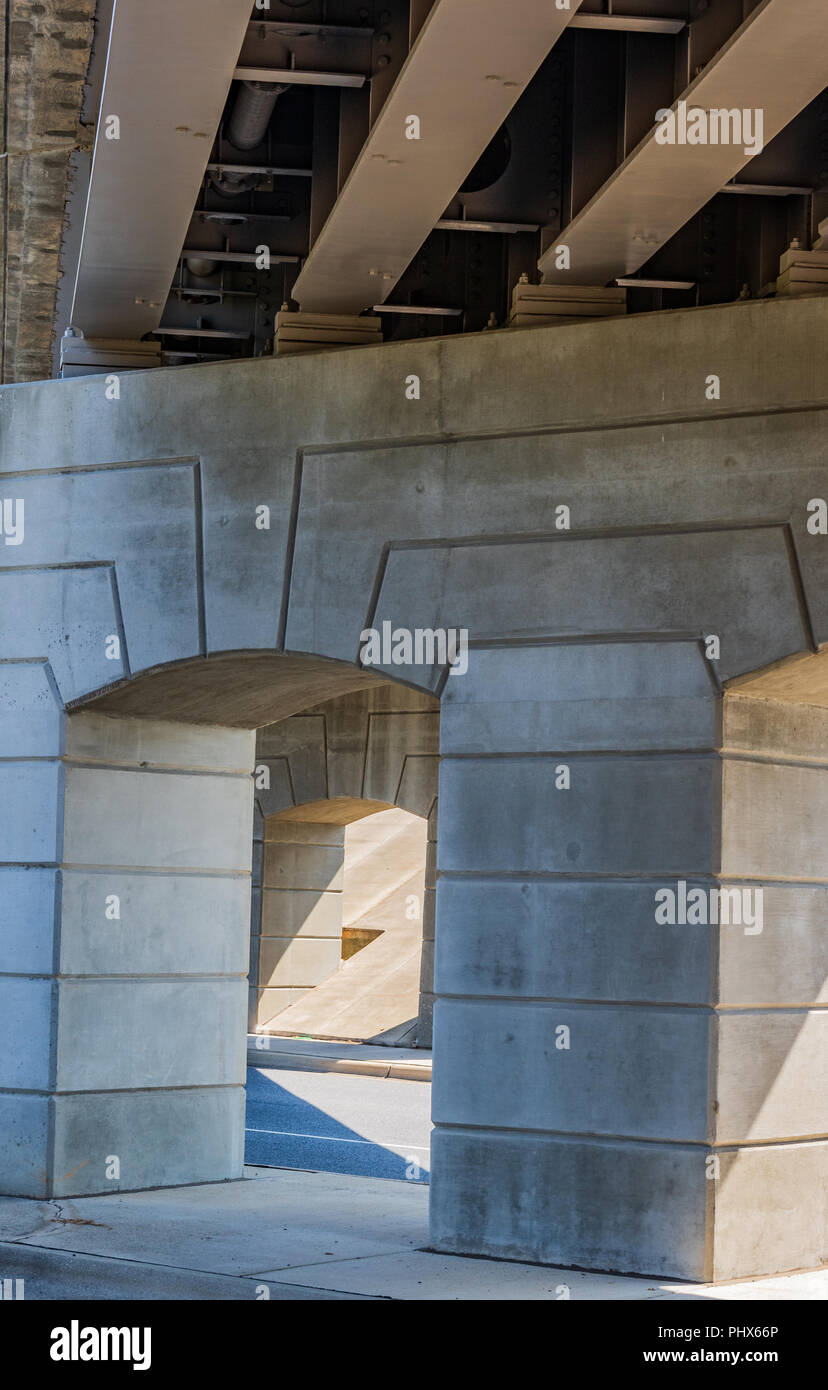 Geometric pattern formed by concrete columns under a bridge Stock Photo ...