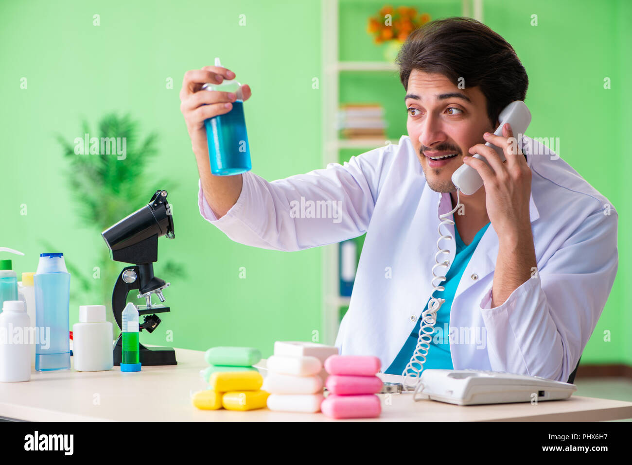 Chemist testing soap in the lab Stock Photo - Alamy
