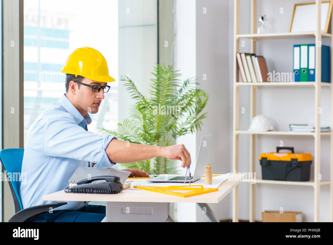 Construction engineer working on new project Stock Photo - Alamy