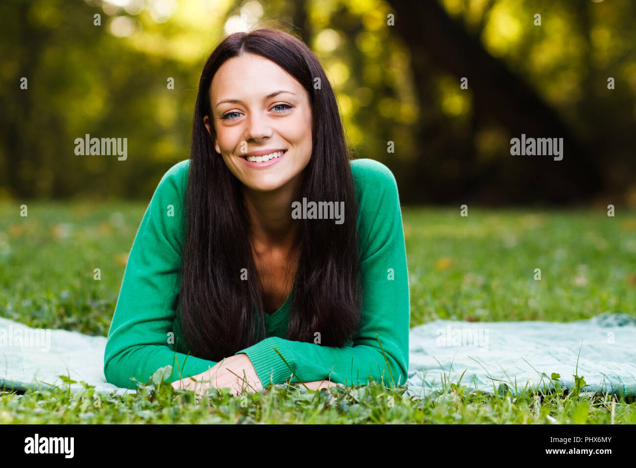 Portrait of beautiful woman resting outdoor Stock Photo - Alamy