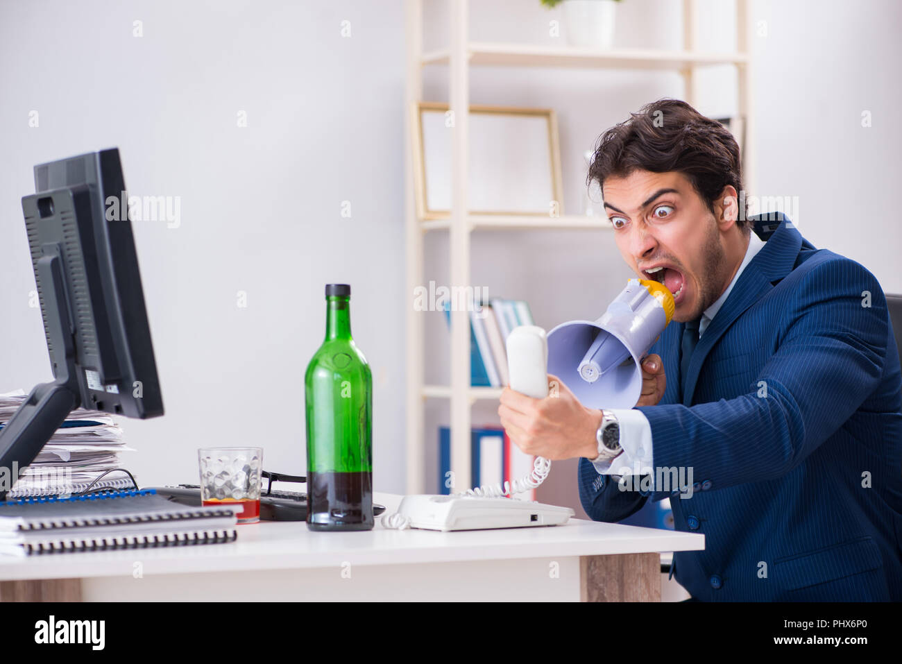 Young drunk employee in the office hi-res stock photography and images ...