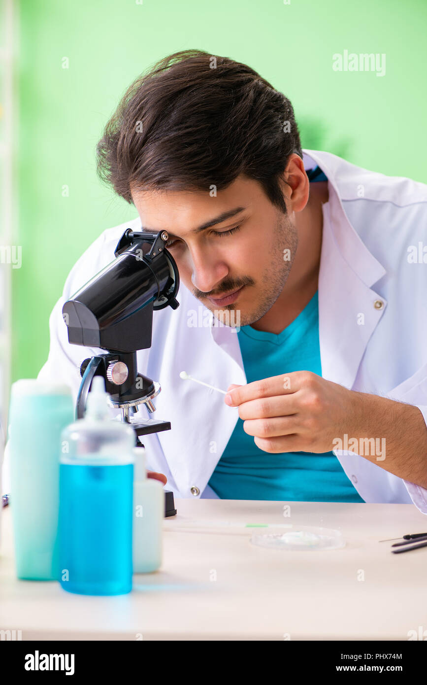 Chemist testing soap in the lab Stock Photo - Alamy