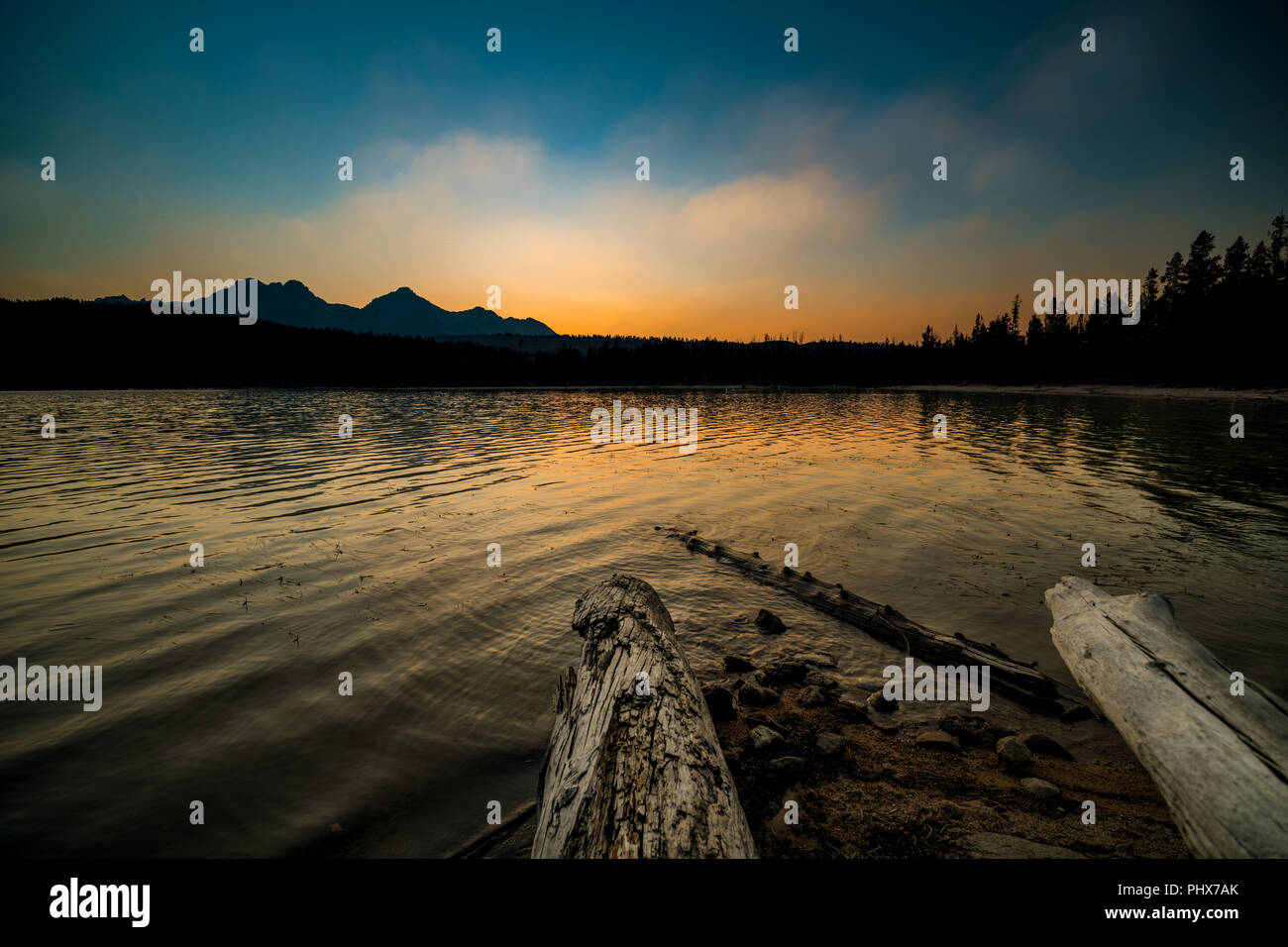 Beautiful ripples in the water of a high mountain lake at sunset Stock ...