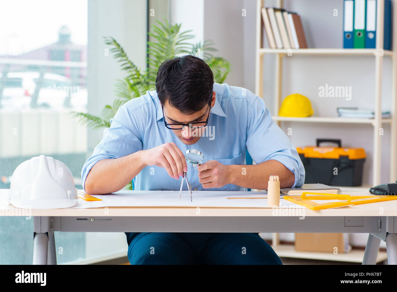 Construction engineer working on new project Stock Photo - Alamy