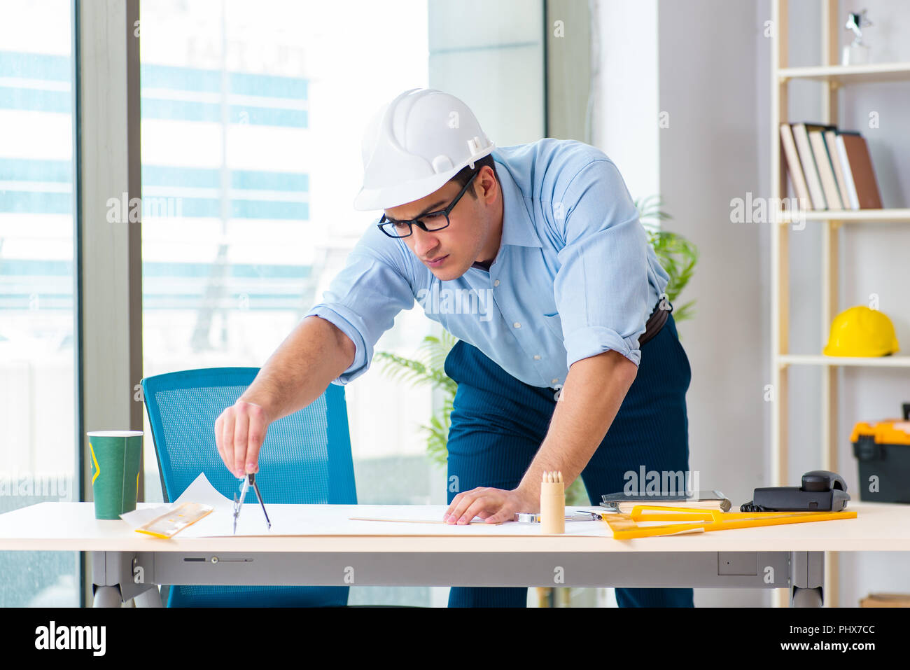 Construction engineer working on new project Stock Photo - Alamy