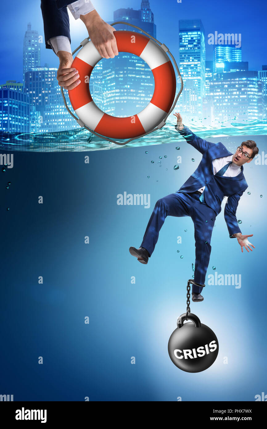 Businessman being saved from crisis Stock Photo - Alamy