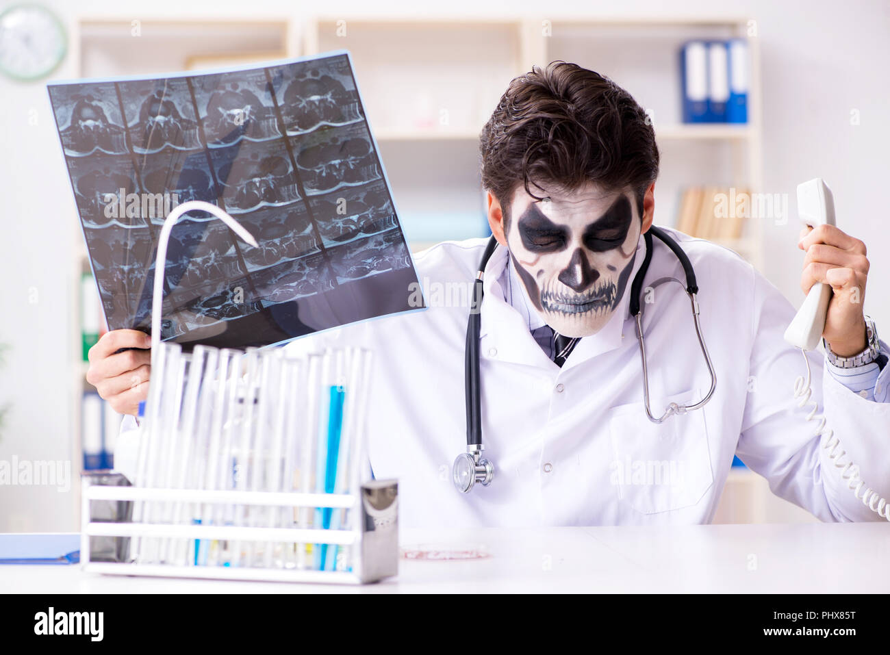 Scary monster doctor working in lab Stock Photo - Alamy