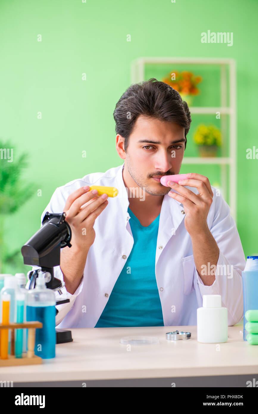 Chemist testing soap in the lab Stock Photo - Alamy