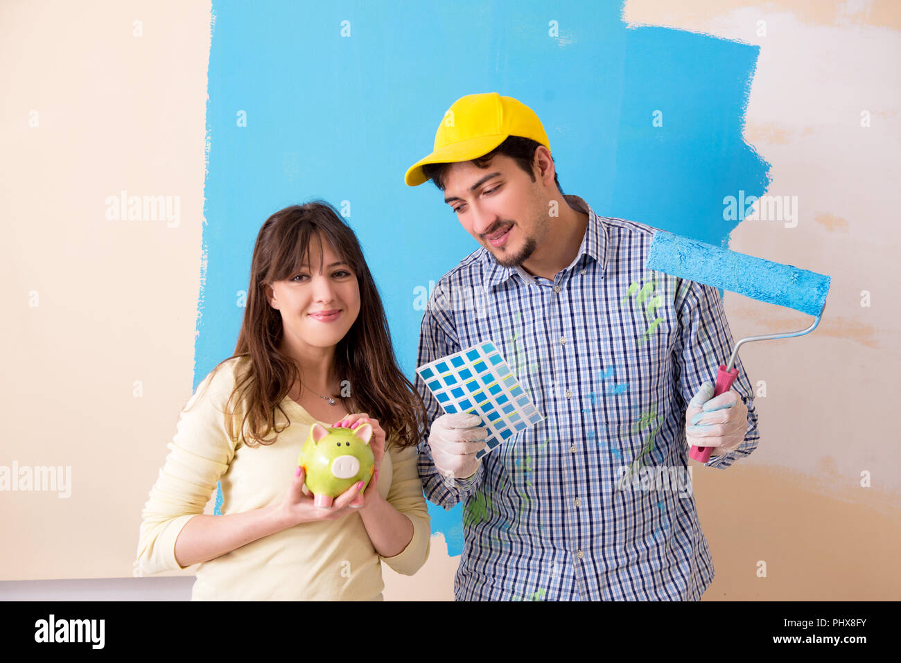 Husband and wife doing renovation at home Stock Photo - Alamy