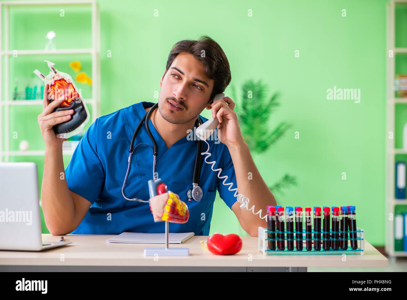 Doctor doing blood analysis in the lab Stock Photo - Alamy