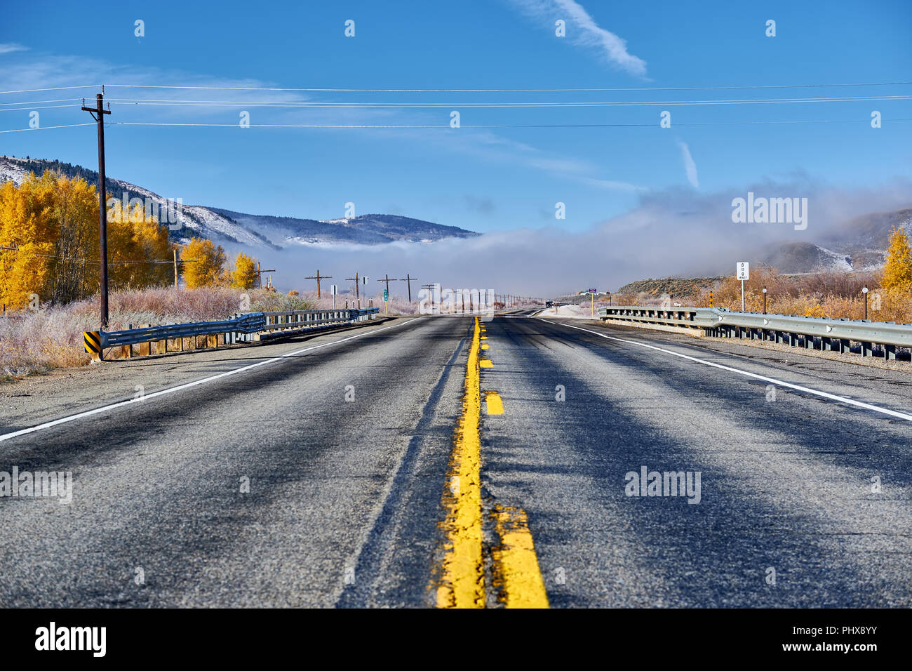 Highway at autumn in Colorado, USA Stock Photo - Alamy