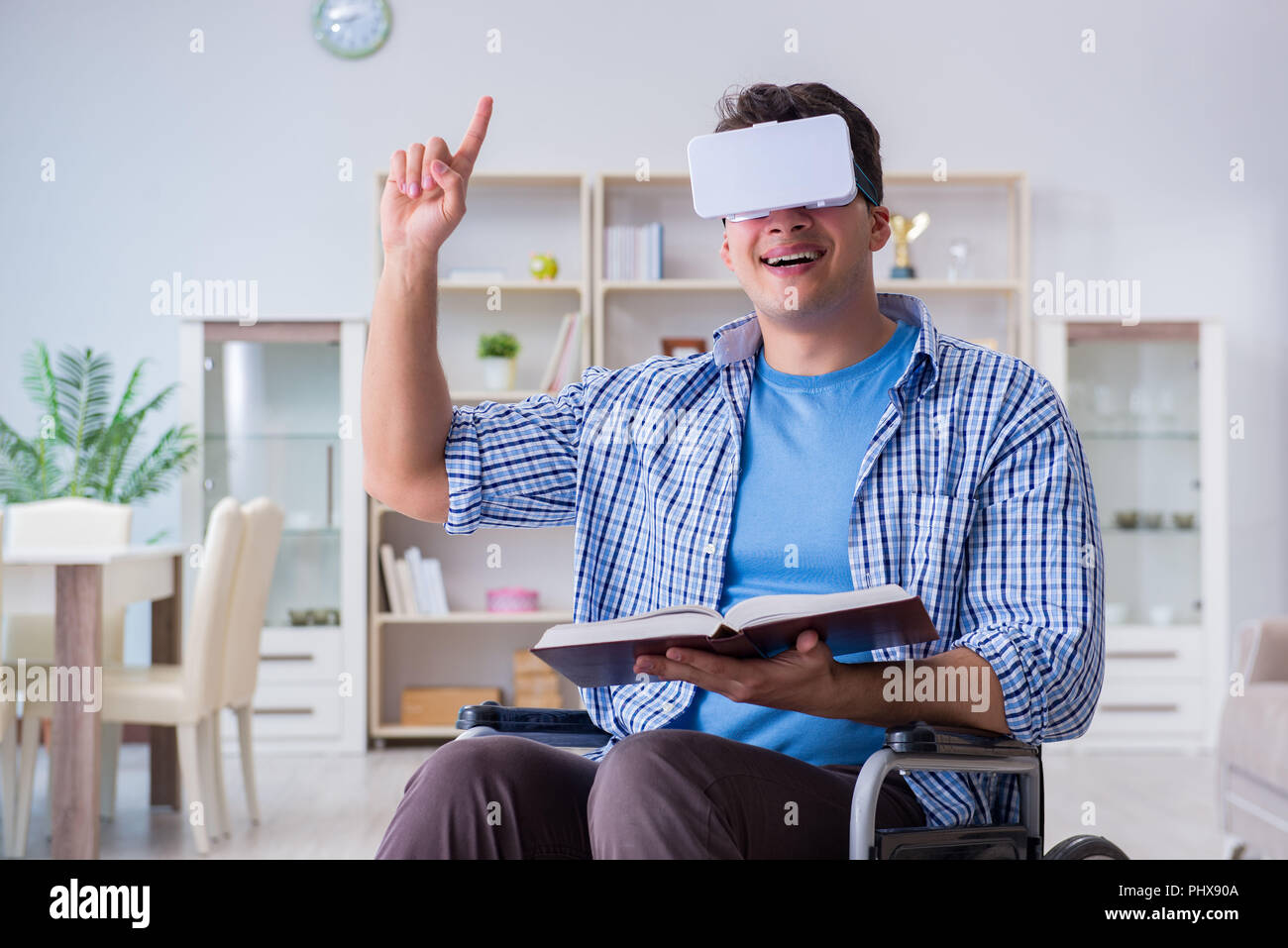 Disabled student studying with virtual reality glasses Stock Photo - Alamy