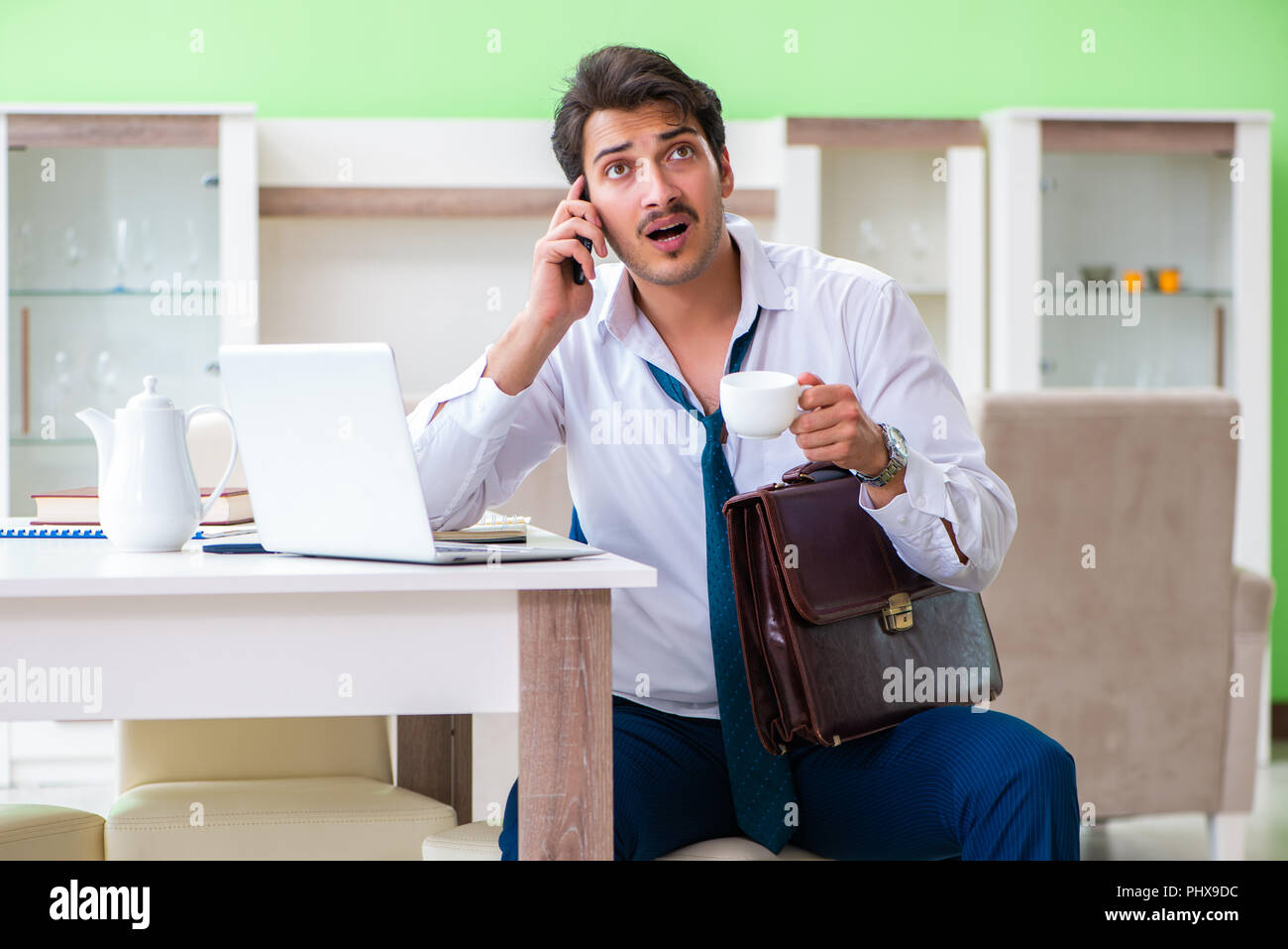 Man dressing up and late for work Stock Photo - Alamy